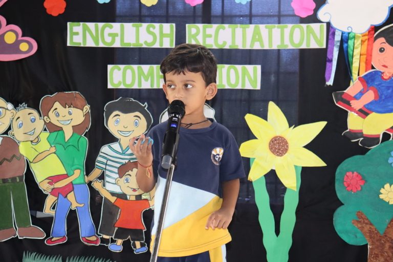 English Recitation Competition – Laxmi International School – Sarigam