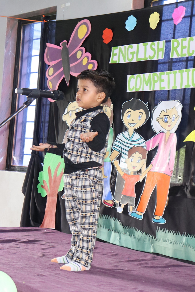 English Recitation Competition – Laxmi International School – Sarigam